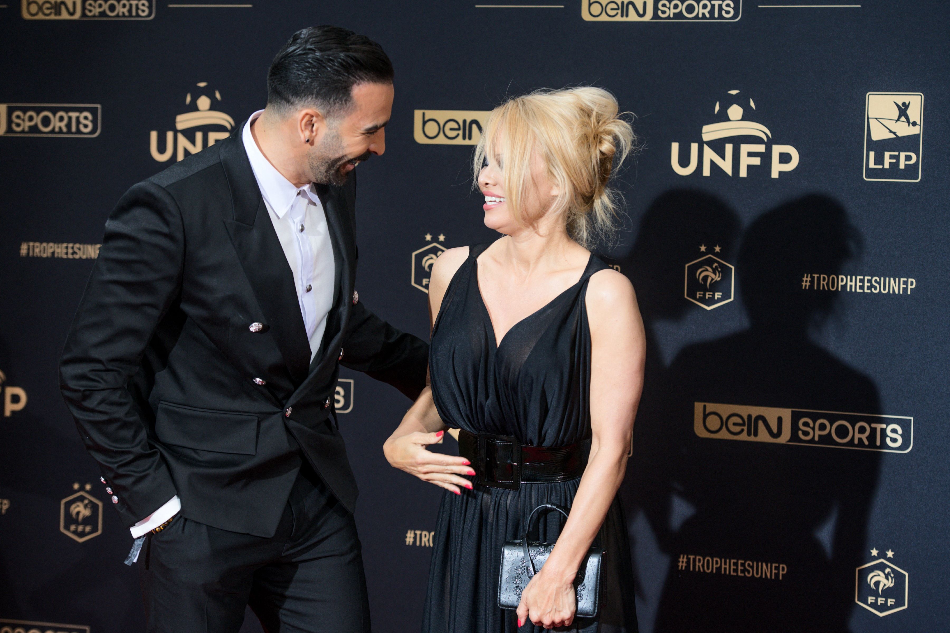 What Really Happened Between Pamela Anderson And French Soccer Star Adil Rami?